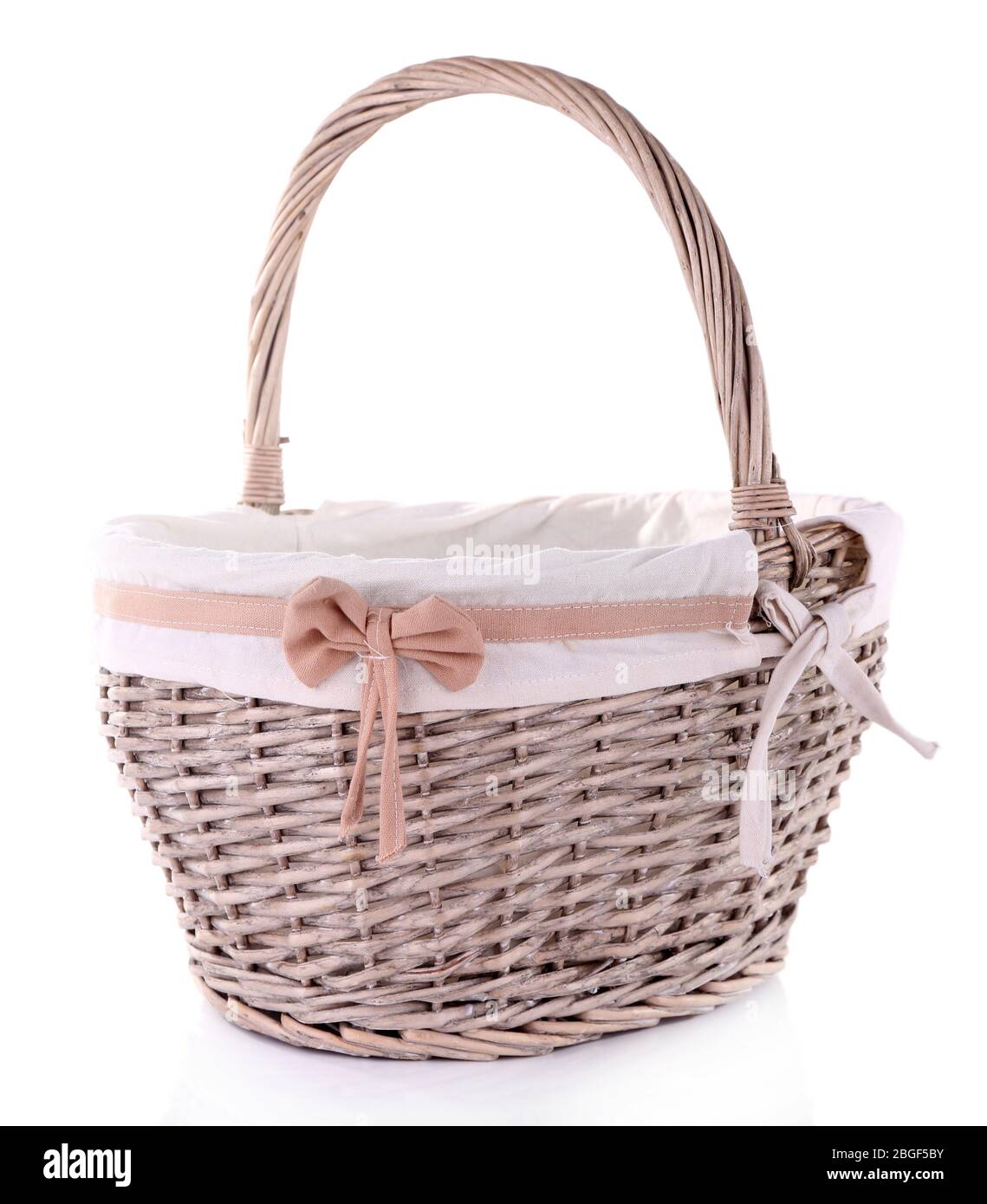 Empty wicker basket isolated on white Stock Photo - Alamy