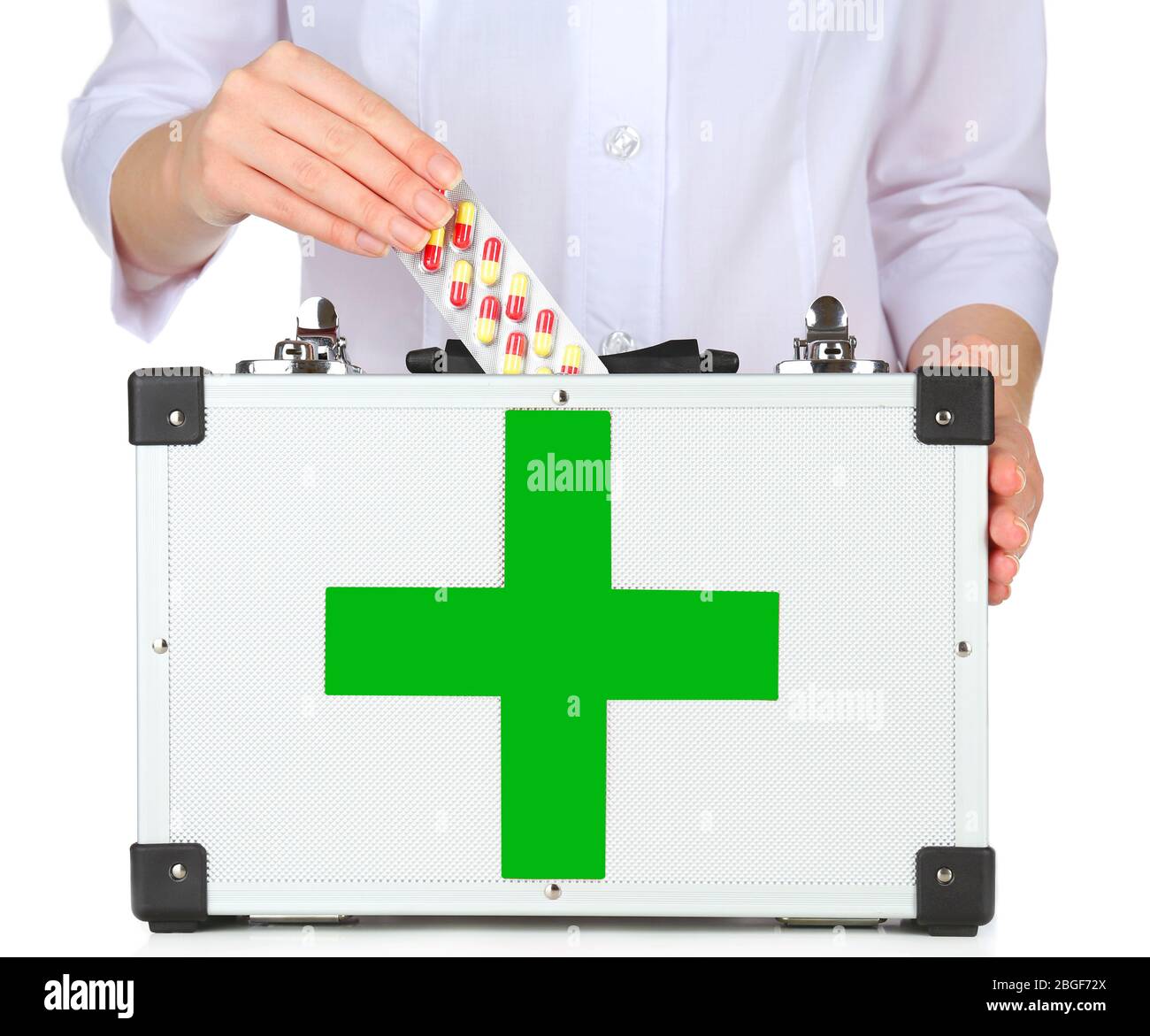 Nurse holding first aid kit, isolated on white Stock Photo - Alamy