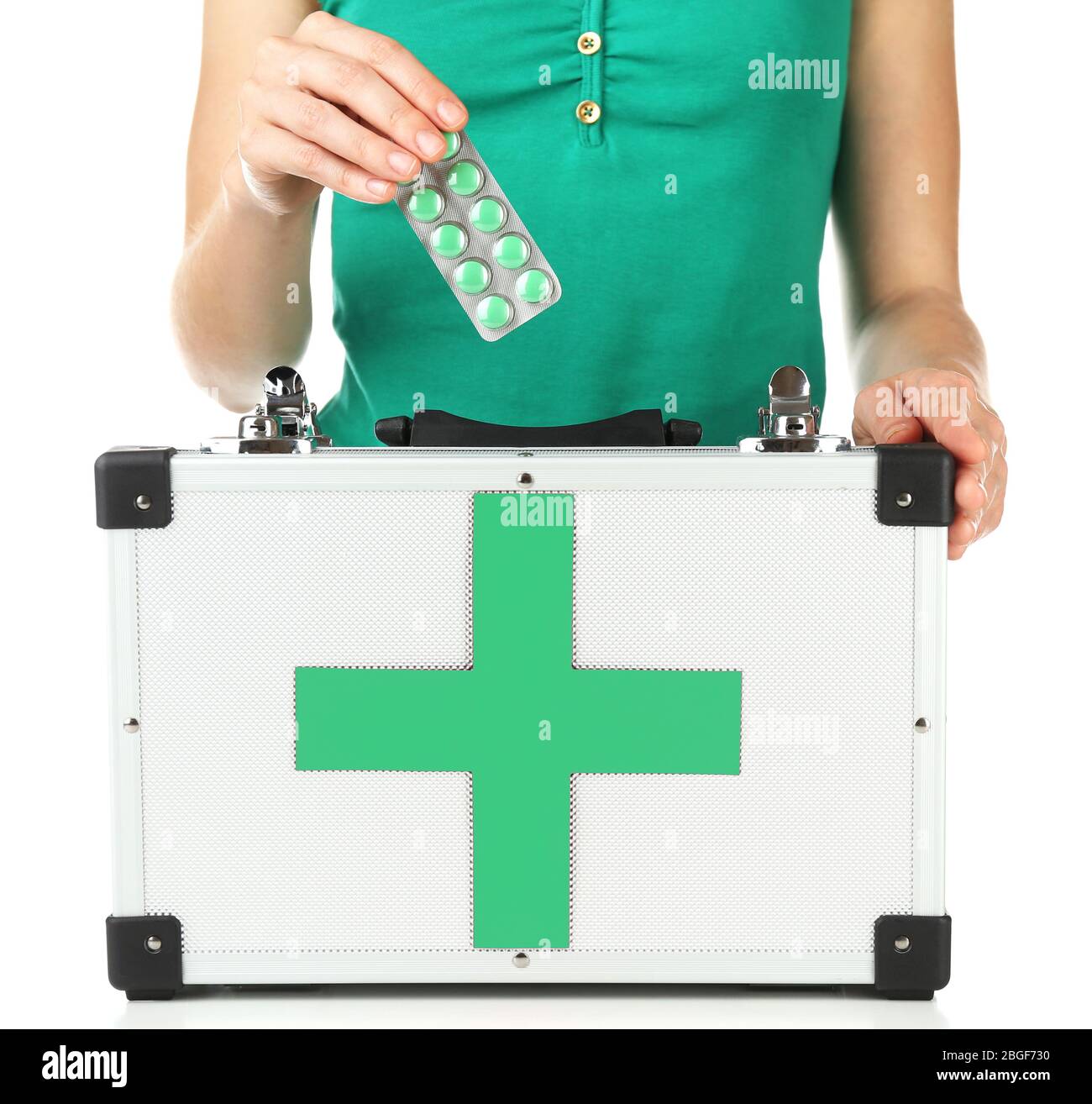 Woman holding first aid kit, isolated on white Stock Photo - Alamy