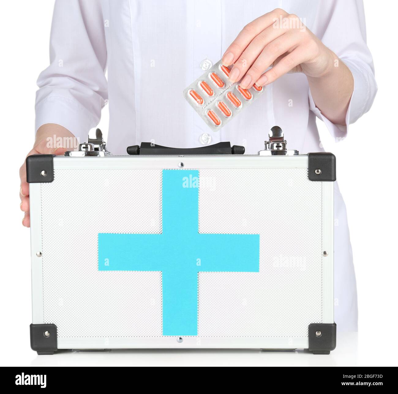 Nurse holding first aid kit, isolated on white Stock Photo - Alamy