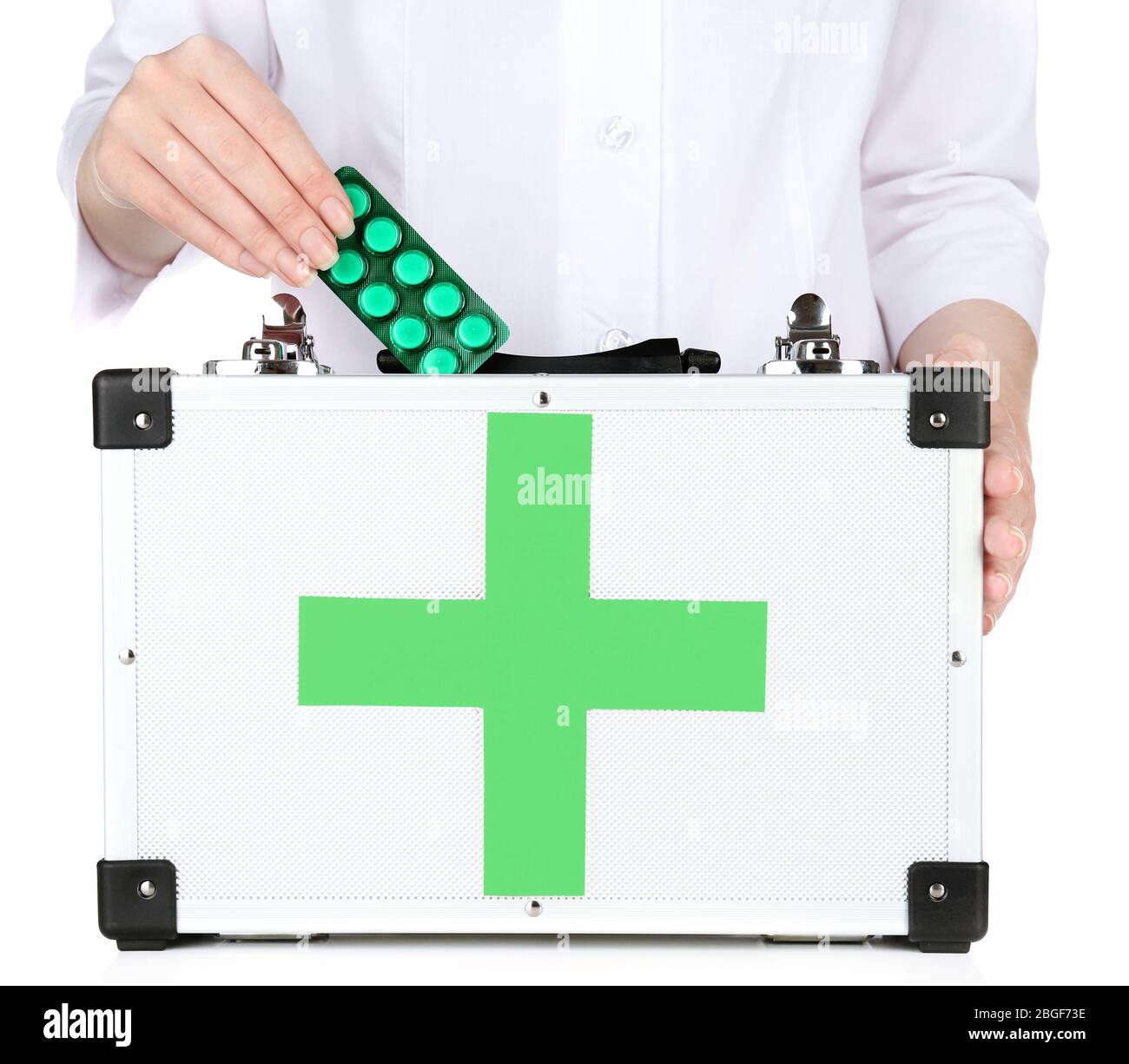 Nurse holding first aid kit, isolated on white Stock Photo - Alamy