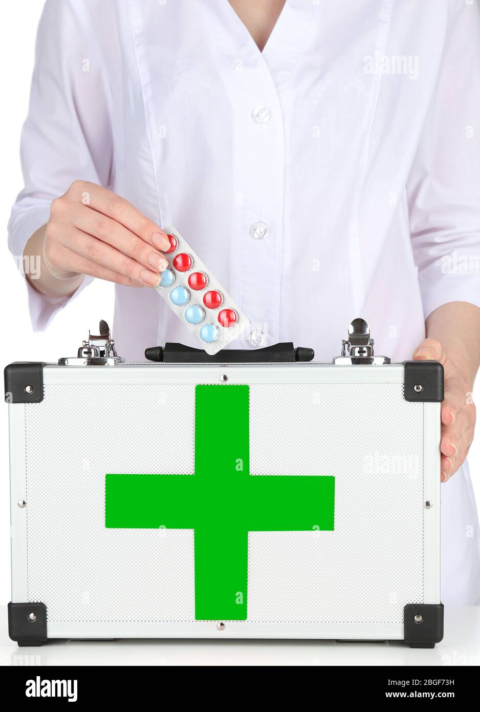 Nurse holding first aid kit, close up Stock Photo - Alamy