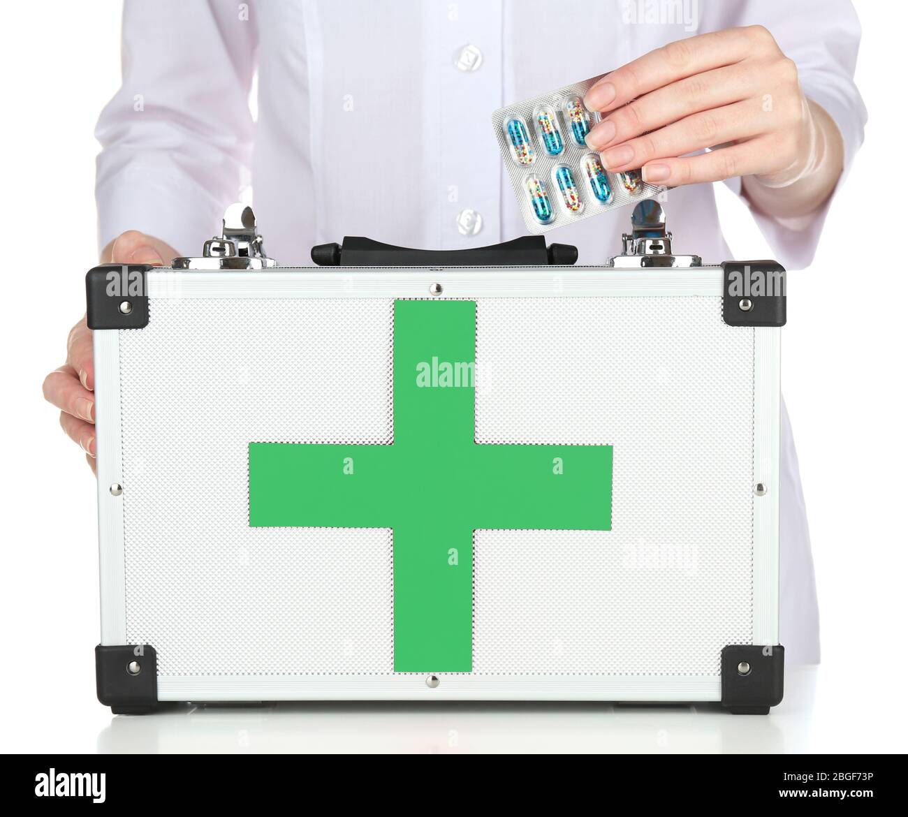 Nurse holding first aid kit, isolated on white Stock Photo - Alamy