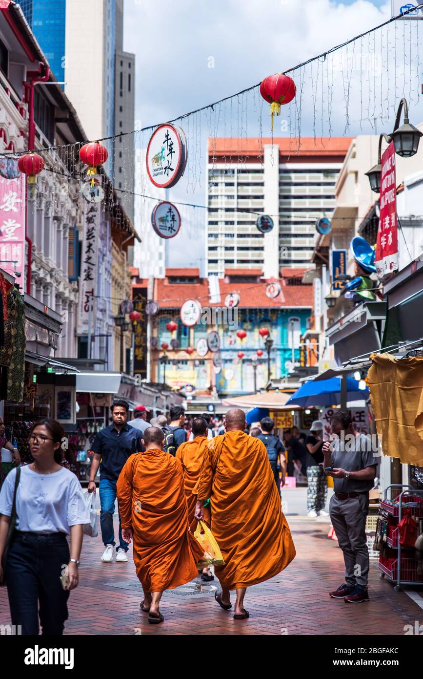 Buddhist monks wearing orange robes hi-res stock photography and images ...