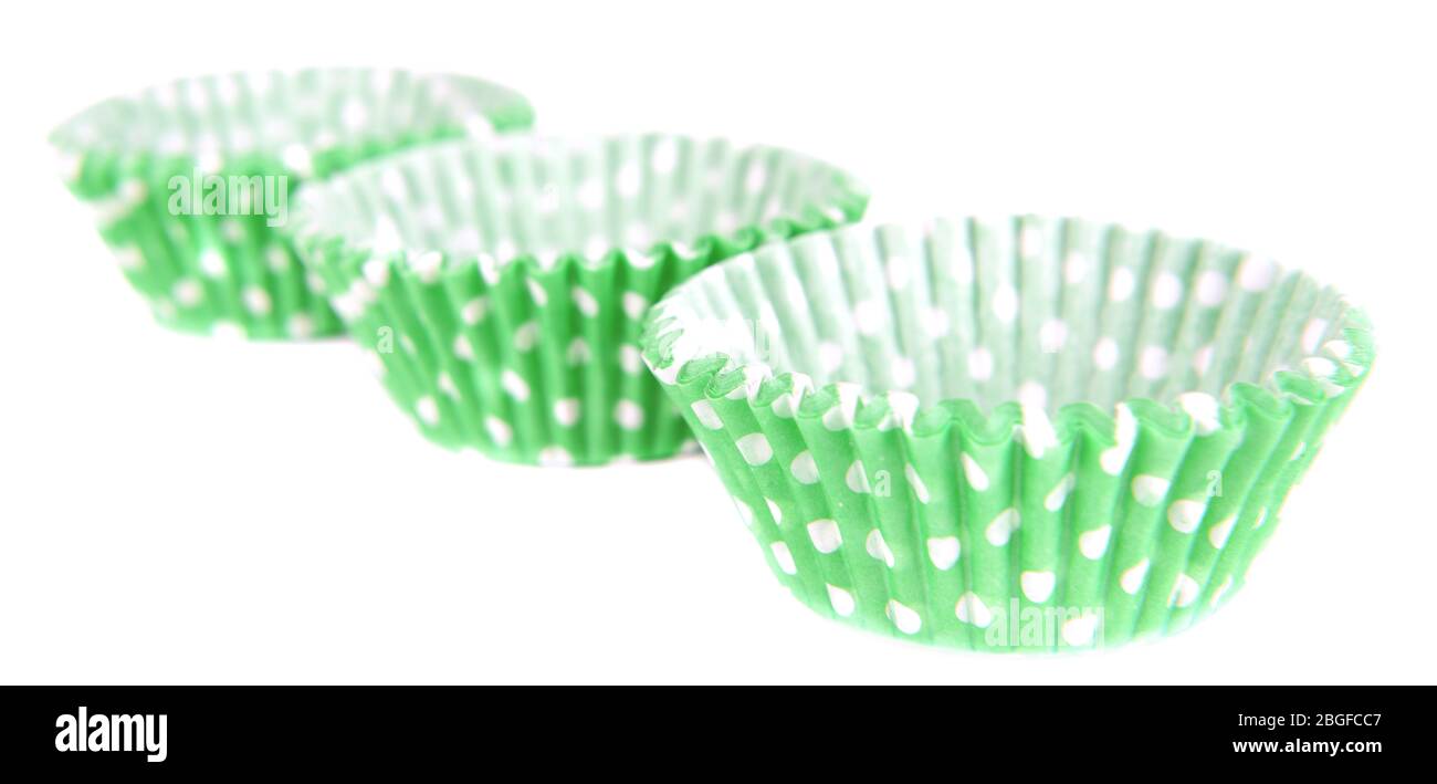 Colorful cupcake wrappers isolated on white Stock Photo - Alamy