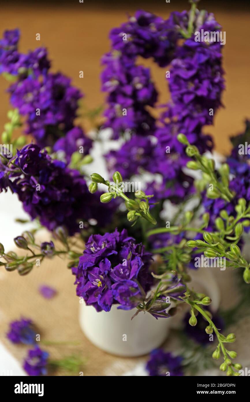 Beautiful wild flowers on table Stock Photo - Alamy