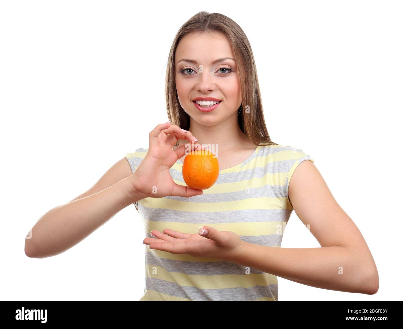 Beautiful girl with orange, isolated on white Stock Photo - Alamy