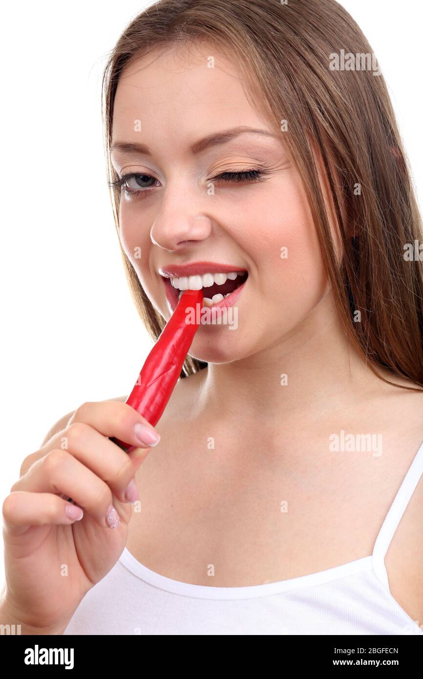 Beautiful woman eating chilli hi-res stock photography and images - Alamy