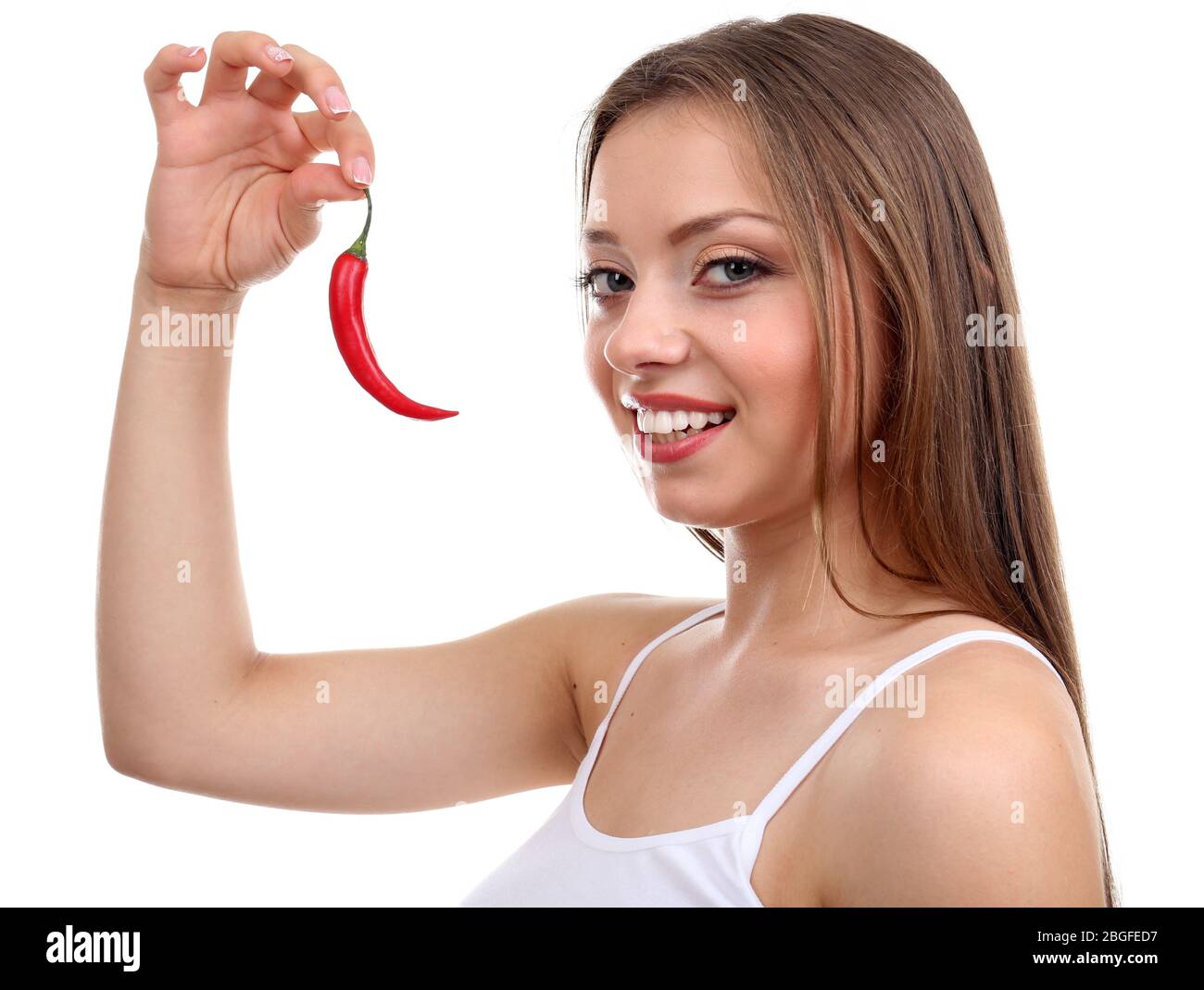 Beautiful woman eating chilli hi-res stock photography and images - Alamy