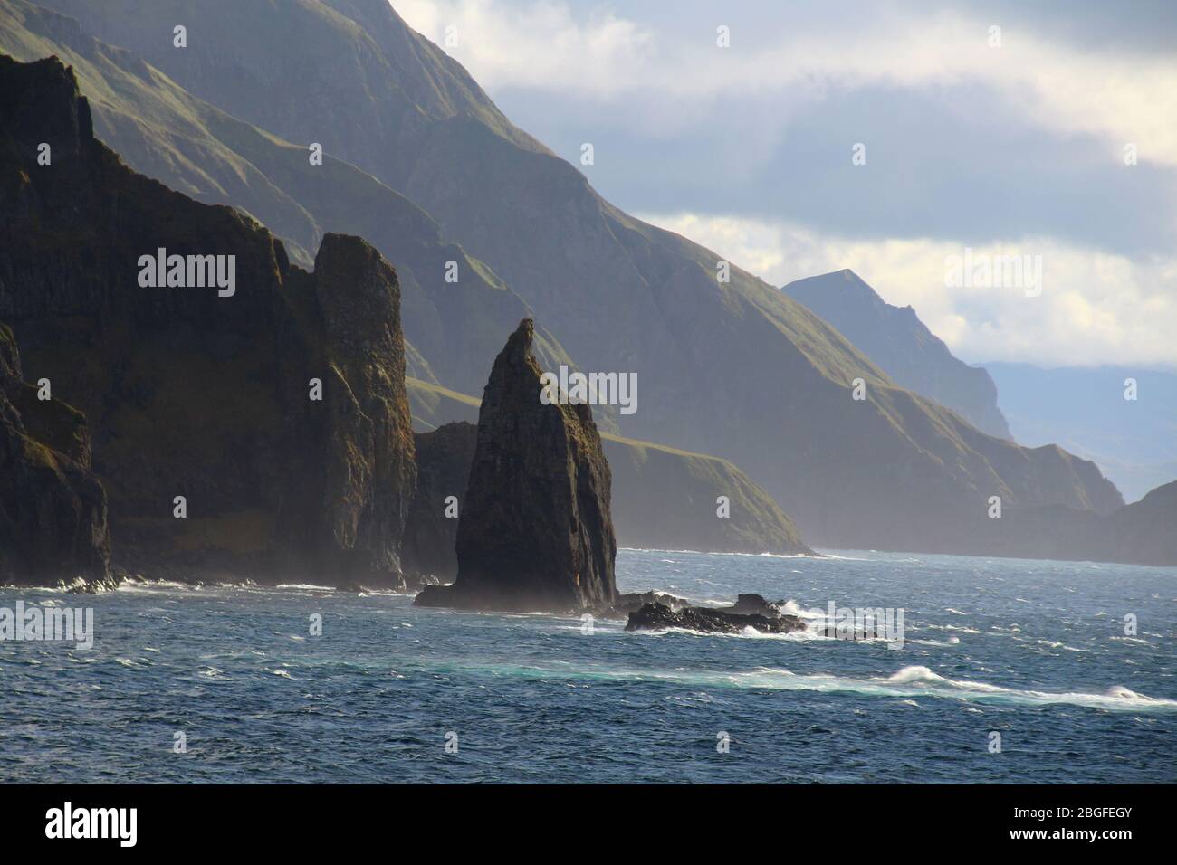 Alaska, The big rock is the Priest Rock, coast of Unalaska Island ...