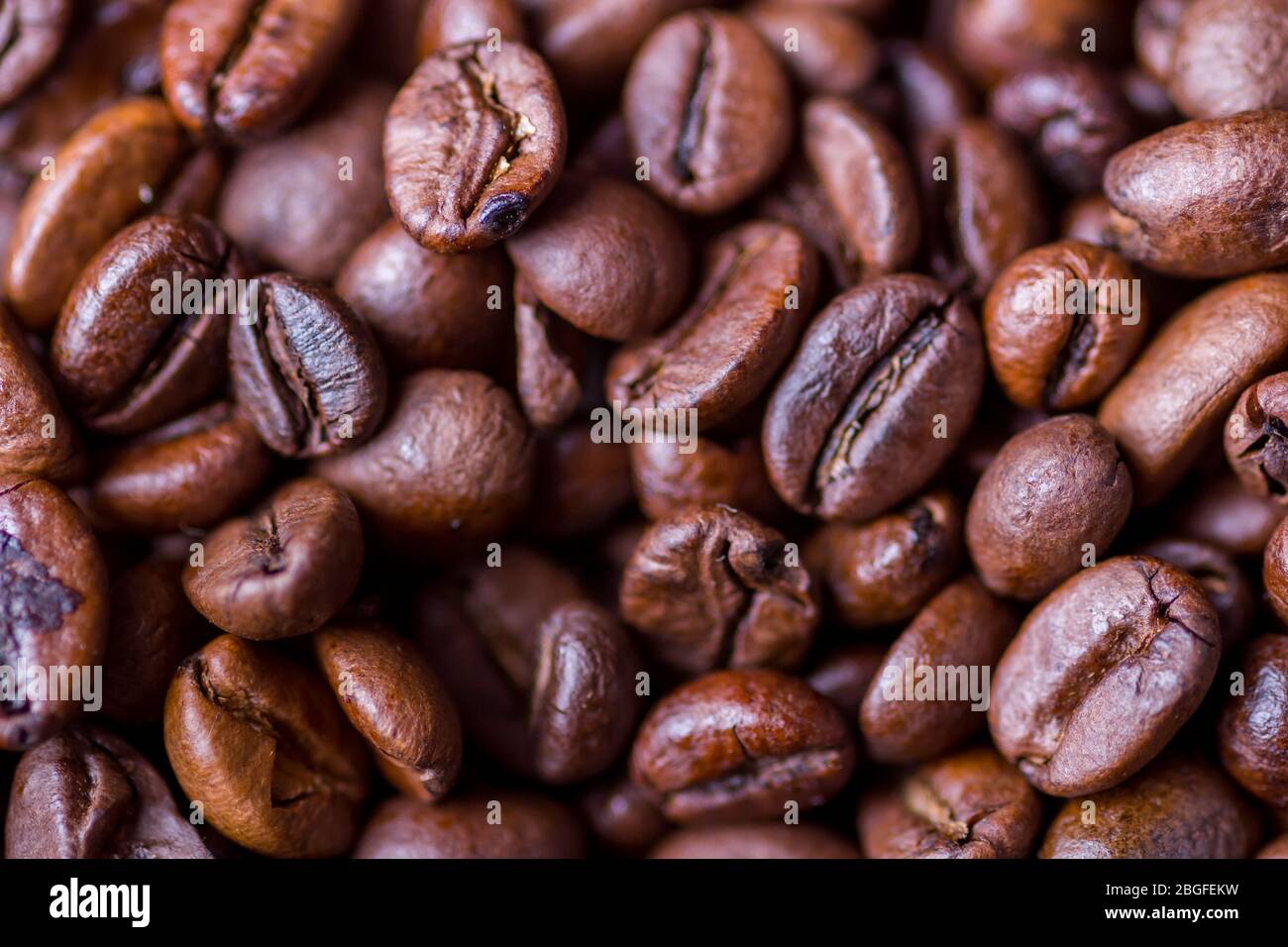 Texture of coffee beans close-up view from above Stock Photo - Alamy