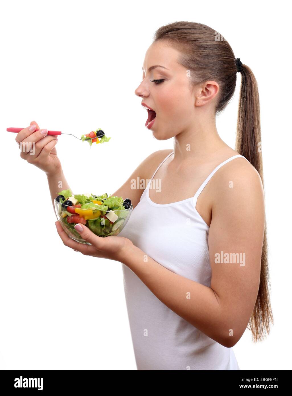 Beautiful girl with fresh salad, isolated on white Stock Photo - Alamy