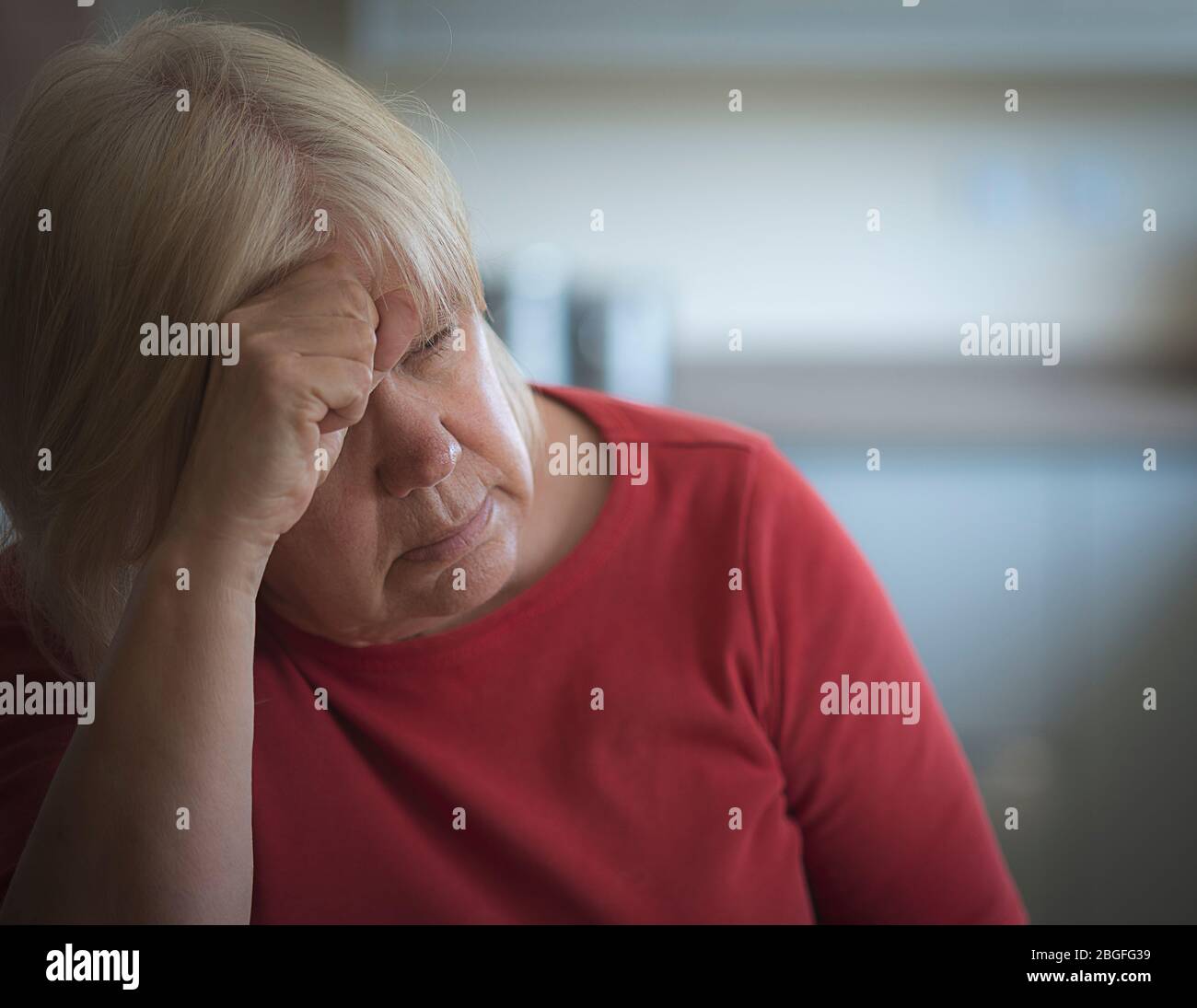 Woman resting head on hand and sad hi-res stock photography and images ...