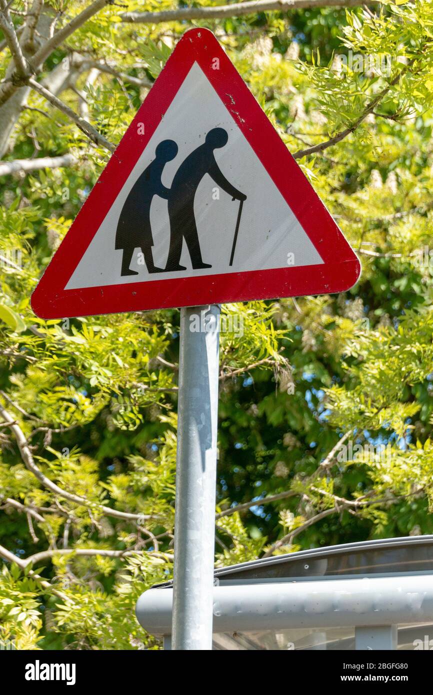 Old people crossing sign hi-res stock photography and images - Alamy