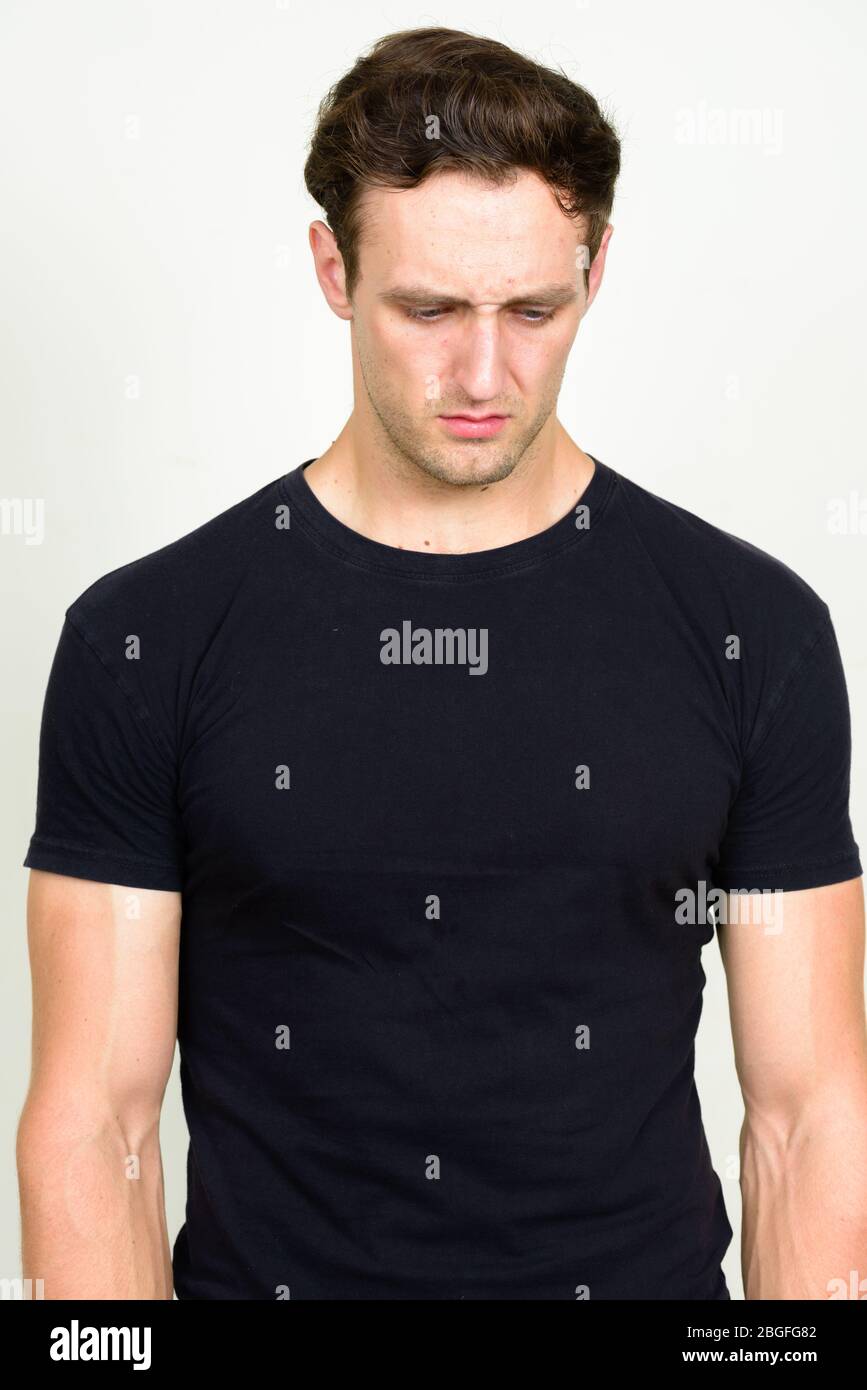 Portrait of stressed young man looking sad and depressed Stock Photo ...