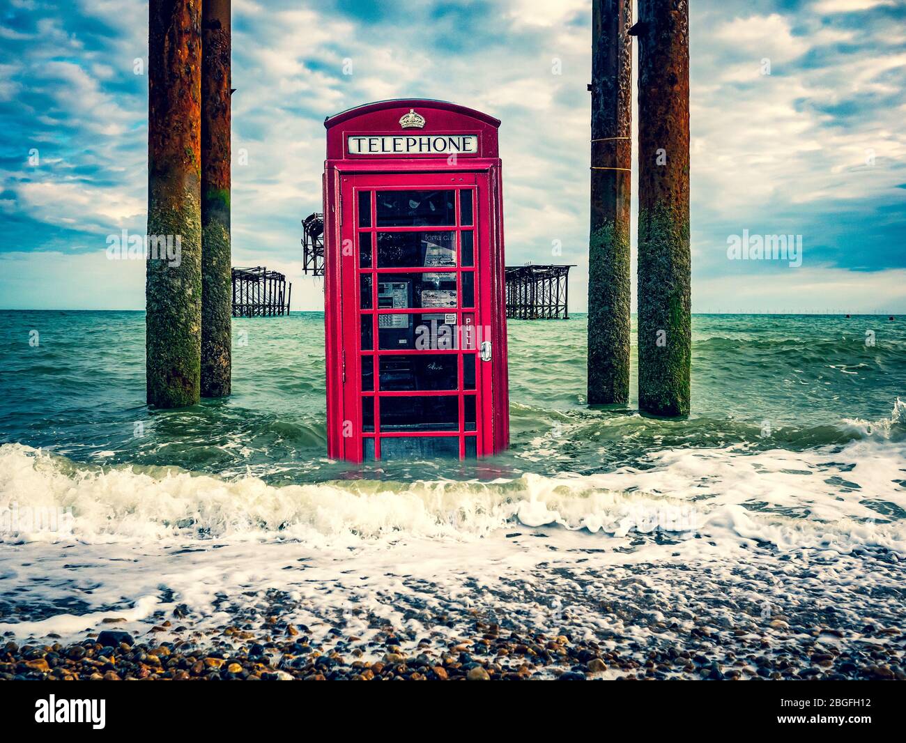 Telephone box in sea Stock Photo - Alamy