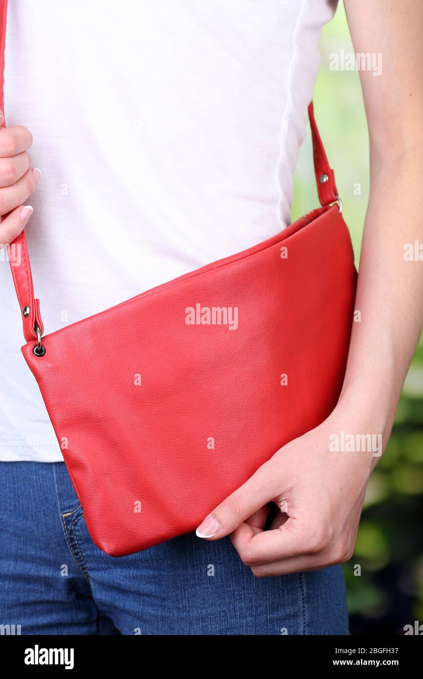 Girl with bag over his shoulder Stock Photo - Alamy