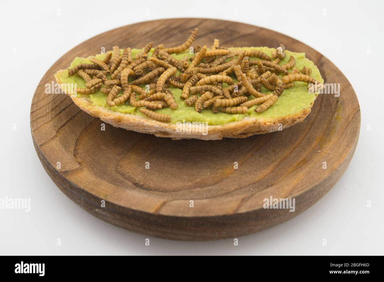 sandwich wiht edible worms with avocado Stock Photo - Alamy