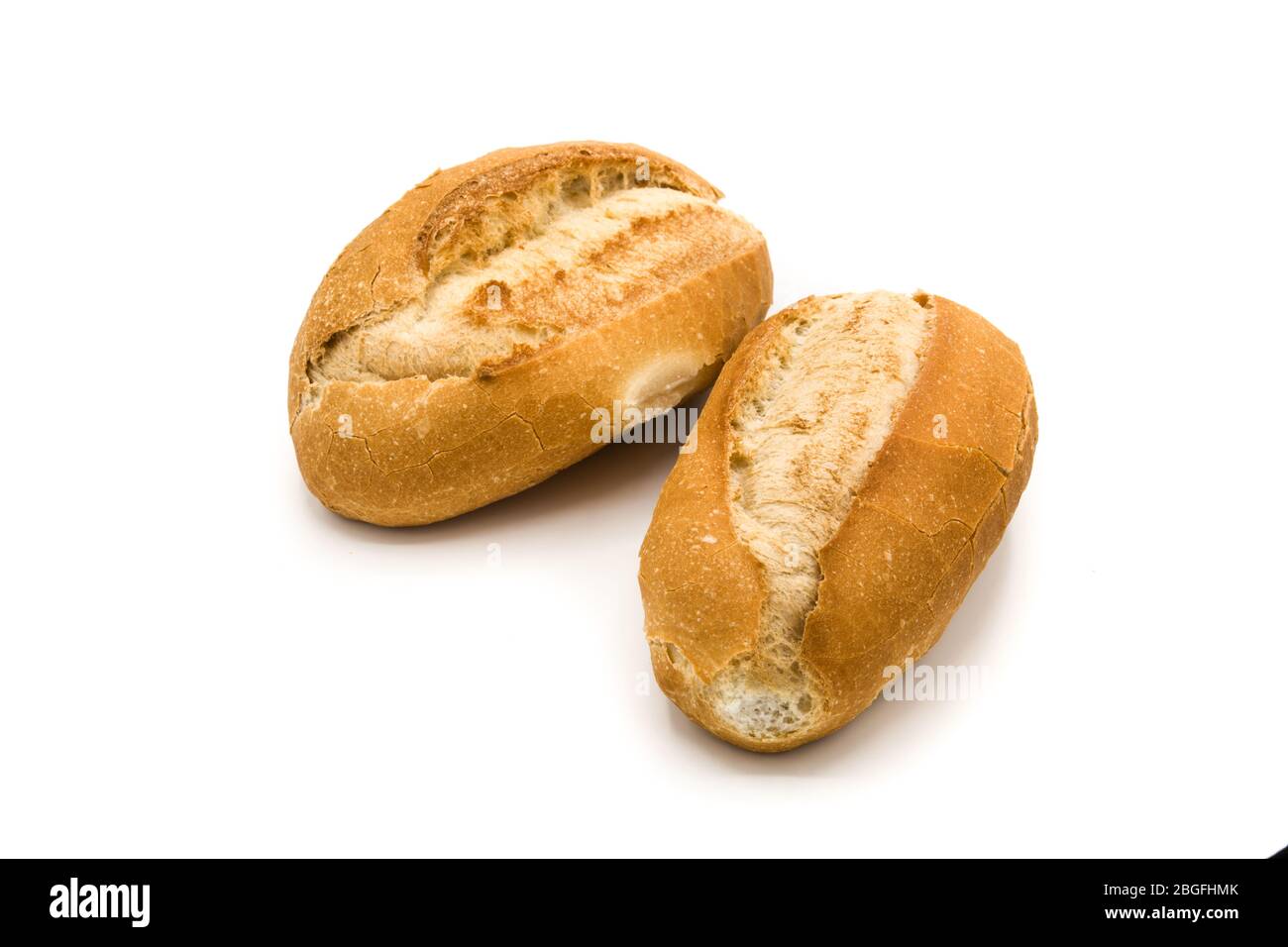 Baked small breads isolated on white background Stock Photo - Alamy