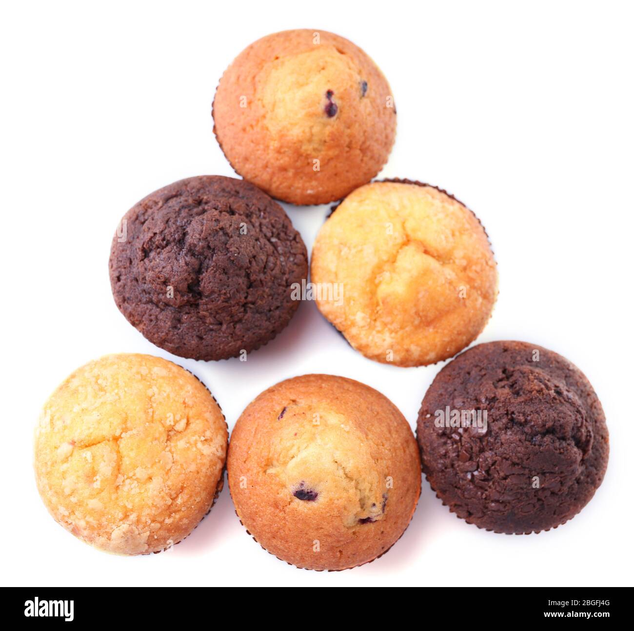 Tasty muffins isolated on white Stock Photo - Alamy