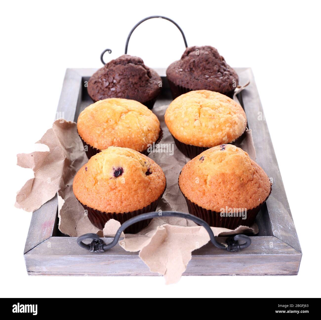 Tasty muffins on wooden tray isolated on white Stock Photo - Alamy