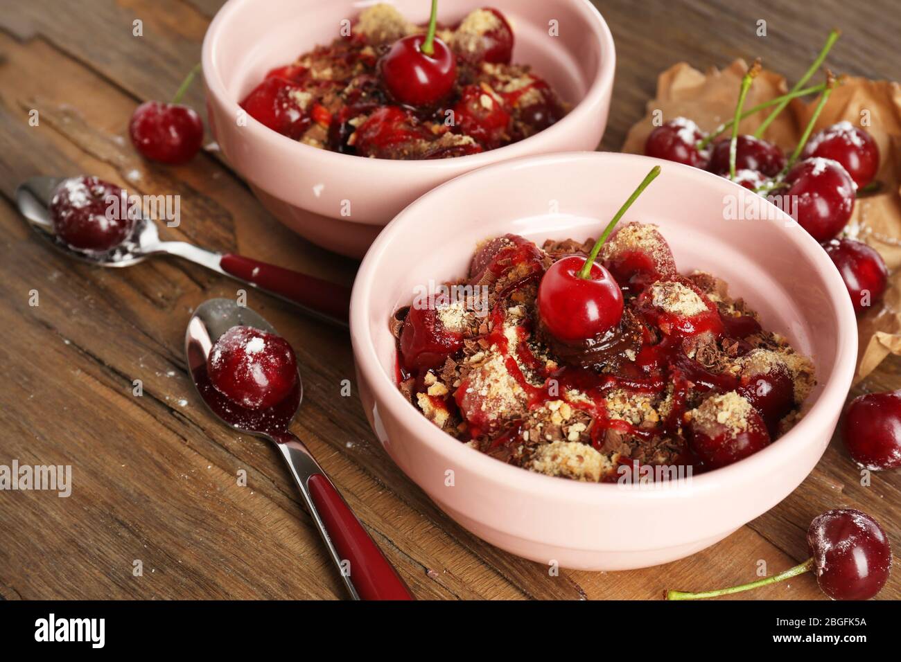 Tasty cherry dessert on table Stock Photo - Alamy