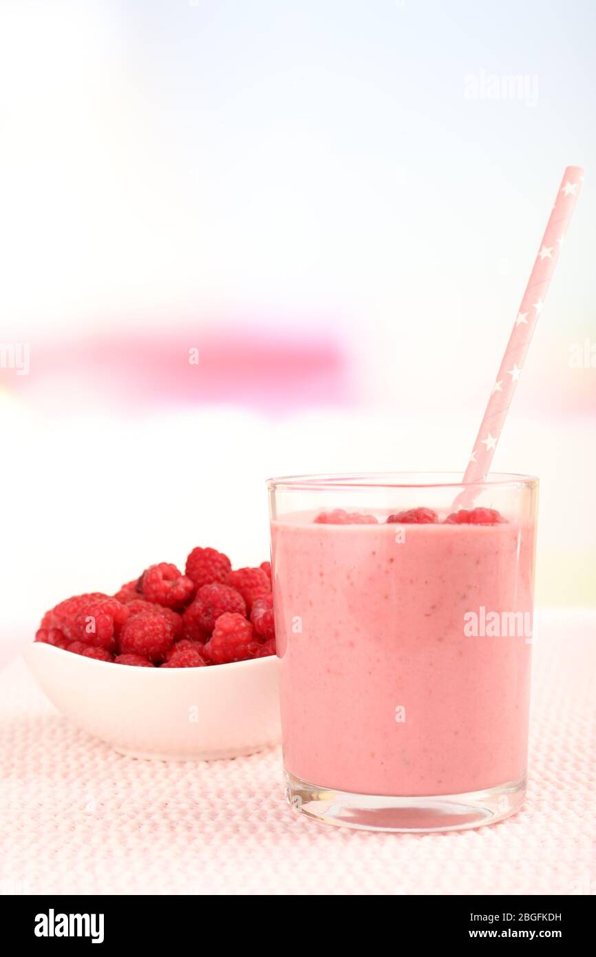 Delicious milkshake on table Stock Photo - Alamy