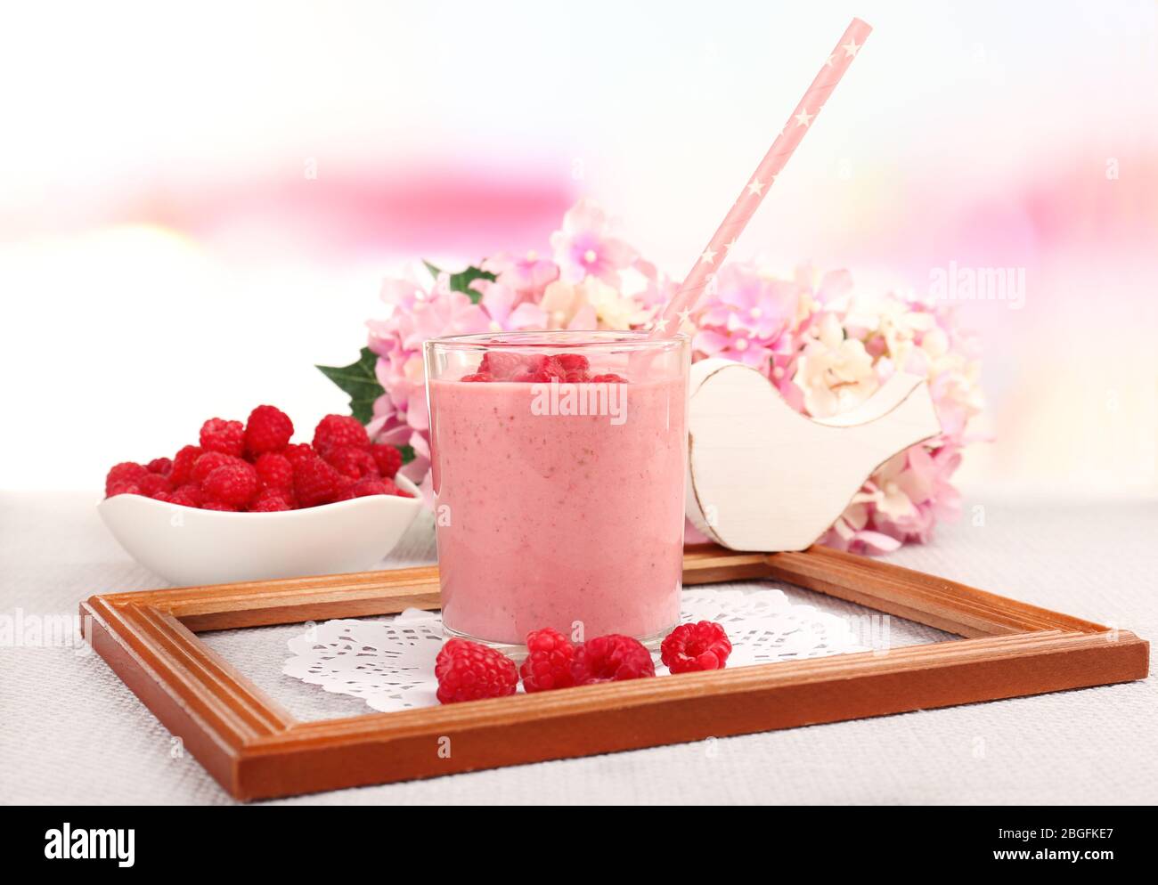 Delicious milkshake on table Stock Photo - Alamy
