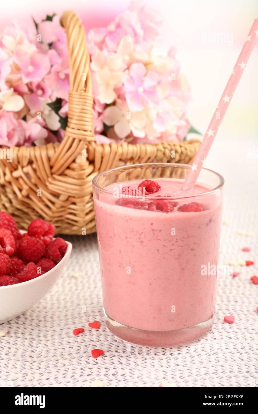 Delicious milkshake on table Stock Photo - Alamy