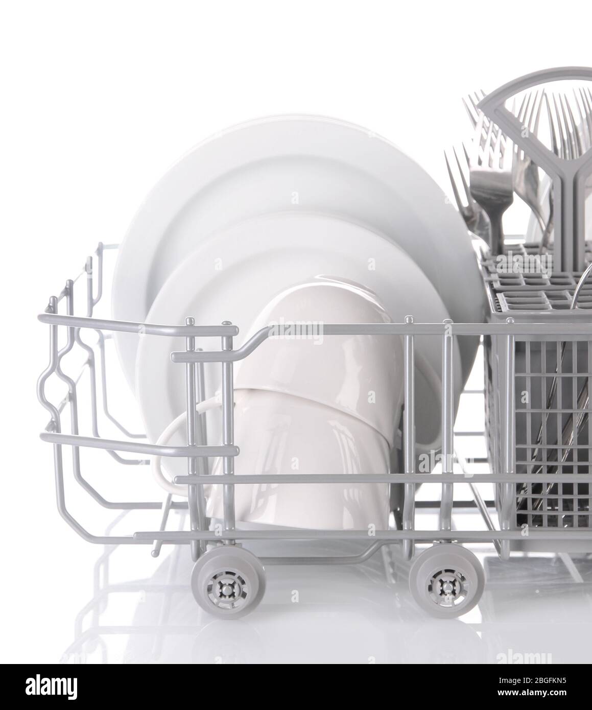 Clean dishes drying on metal dish rack, isolated on white Stock Photo ...