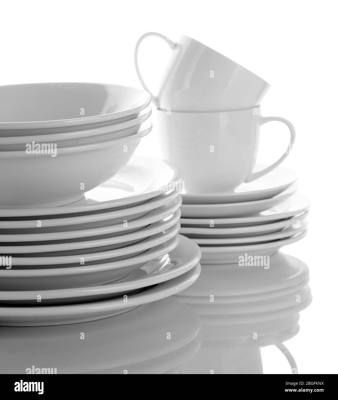 Clean dishes isolated on white Stock Photo - Alamy