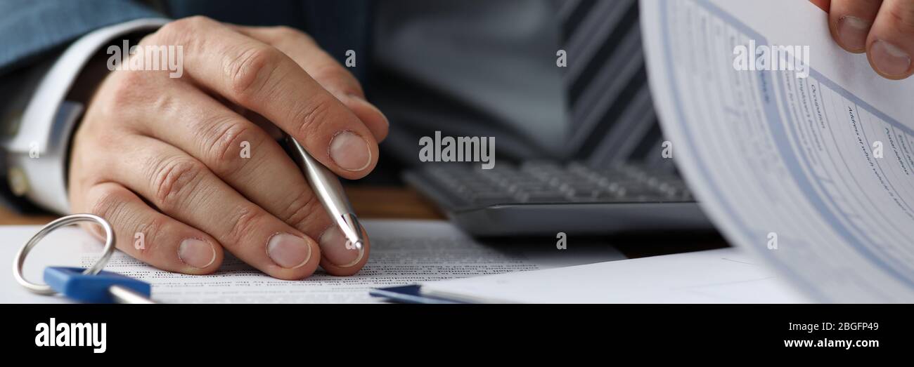 Man in presentable grey suit Stock Photo - Alamy