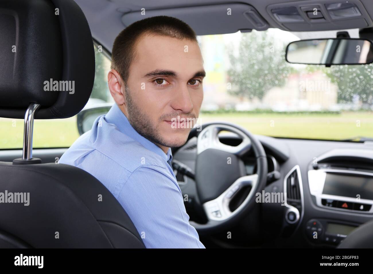 Man driving car Stock Photo - Alamy