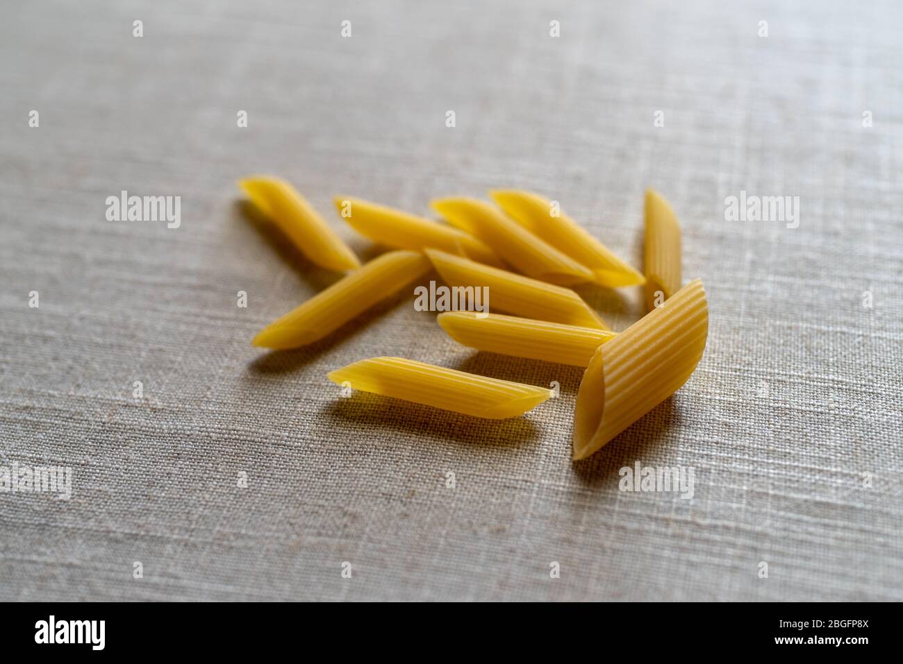 Italian uncooked dry pasta Penne rigate Stock Photo - Alamy