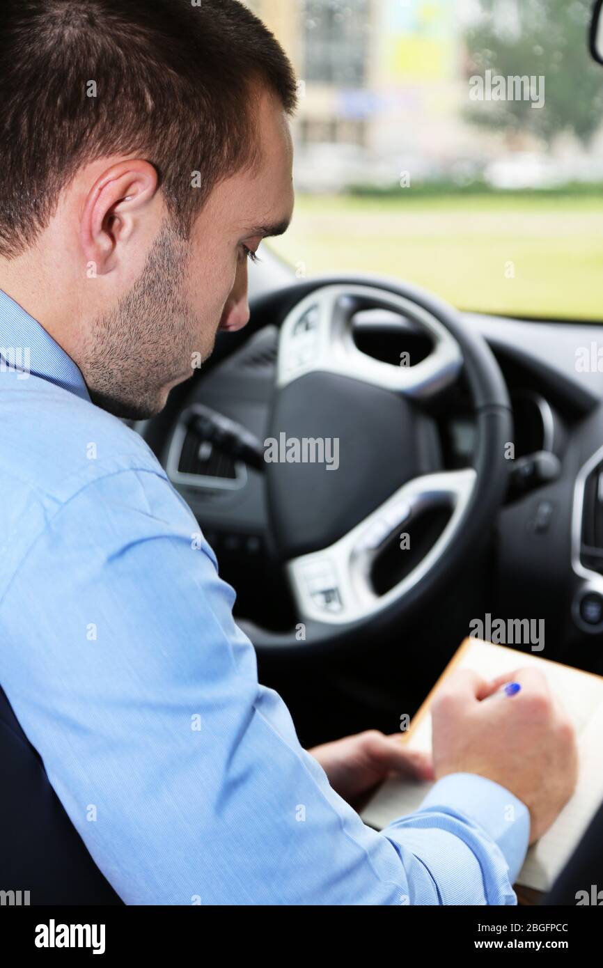Man driving car Stock Photo - Alamy