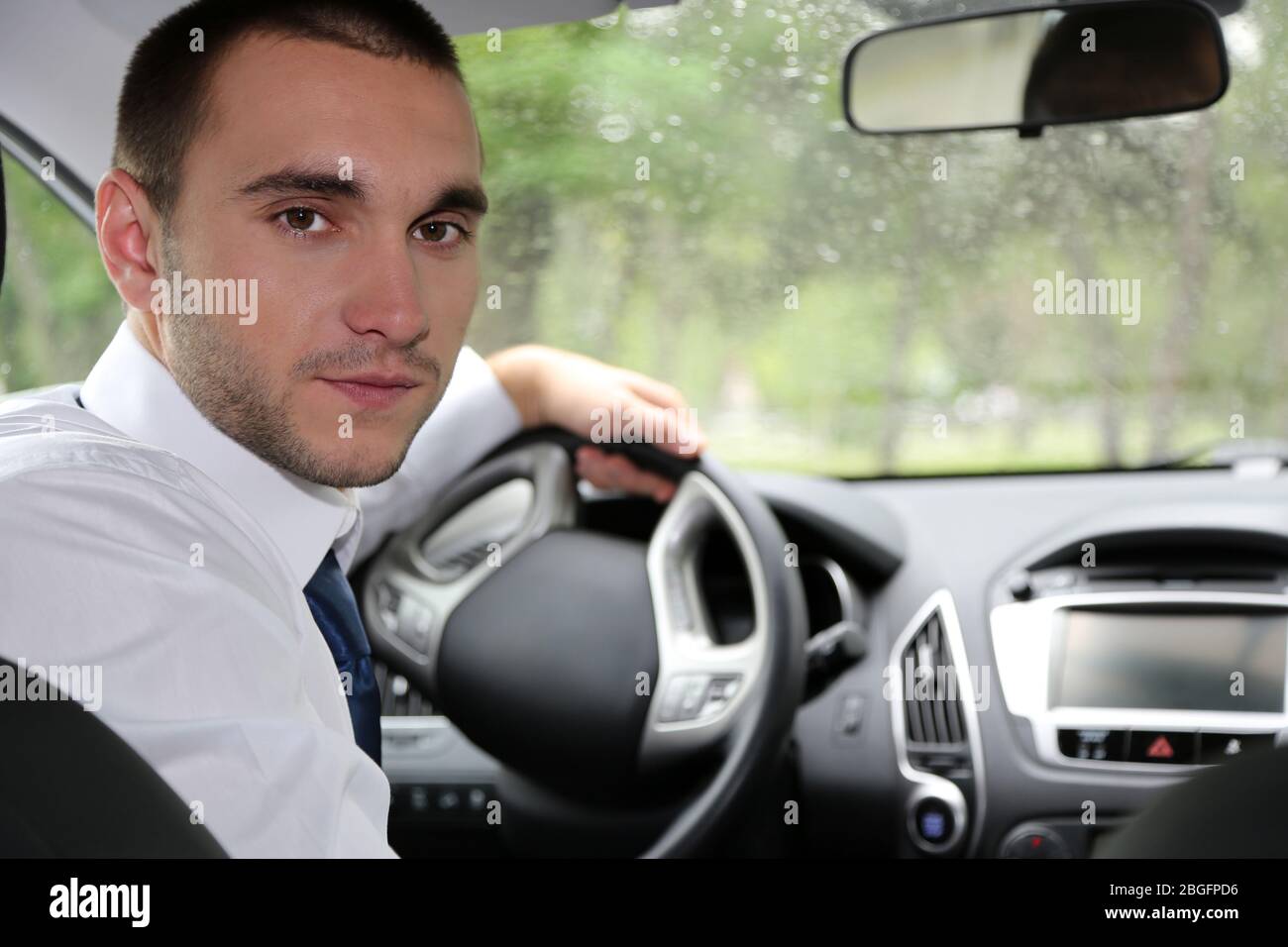 Man driving car Stock Photo - Alamy