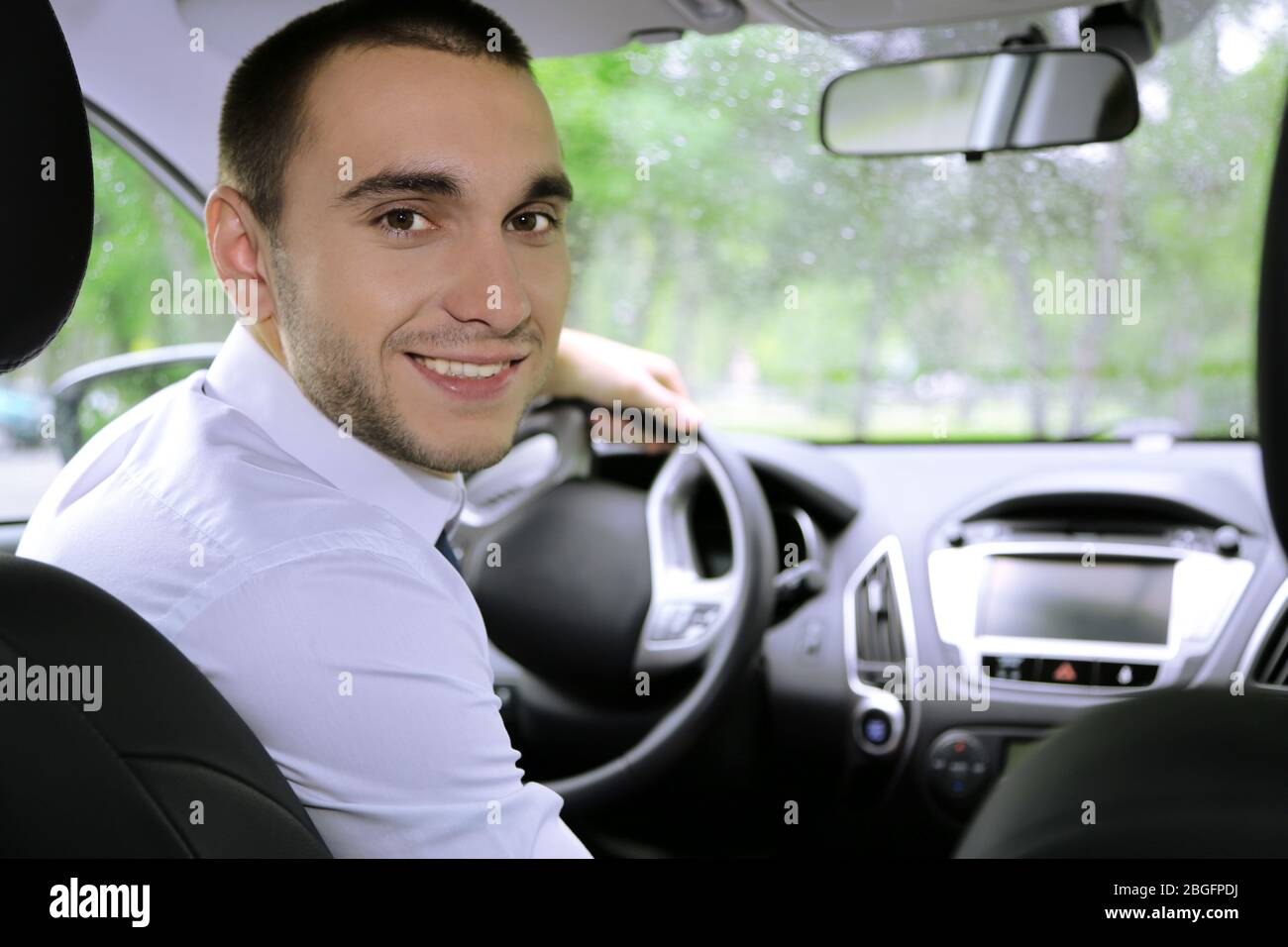Man driving car Stock Photo - Alamy