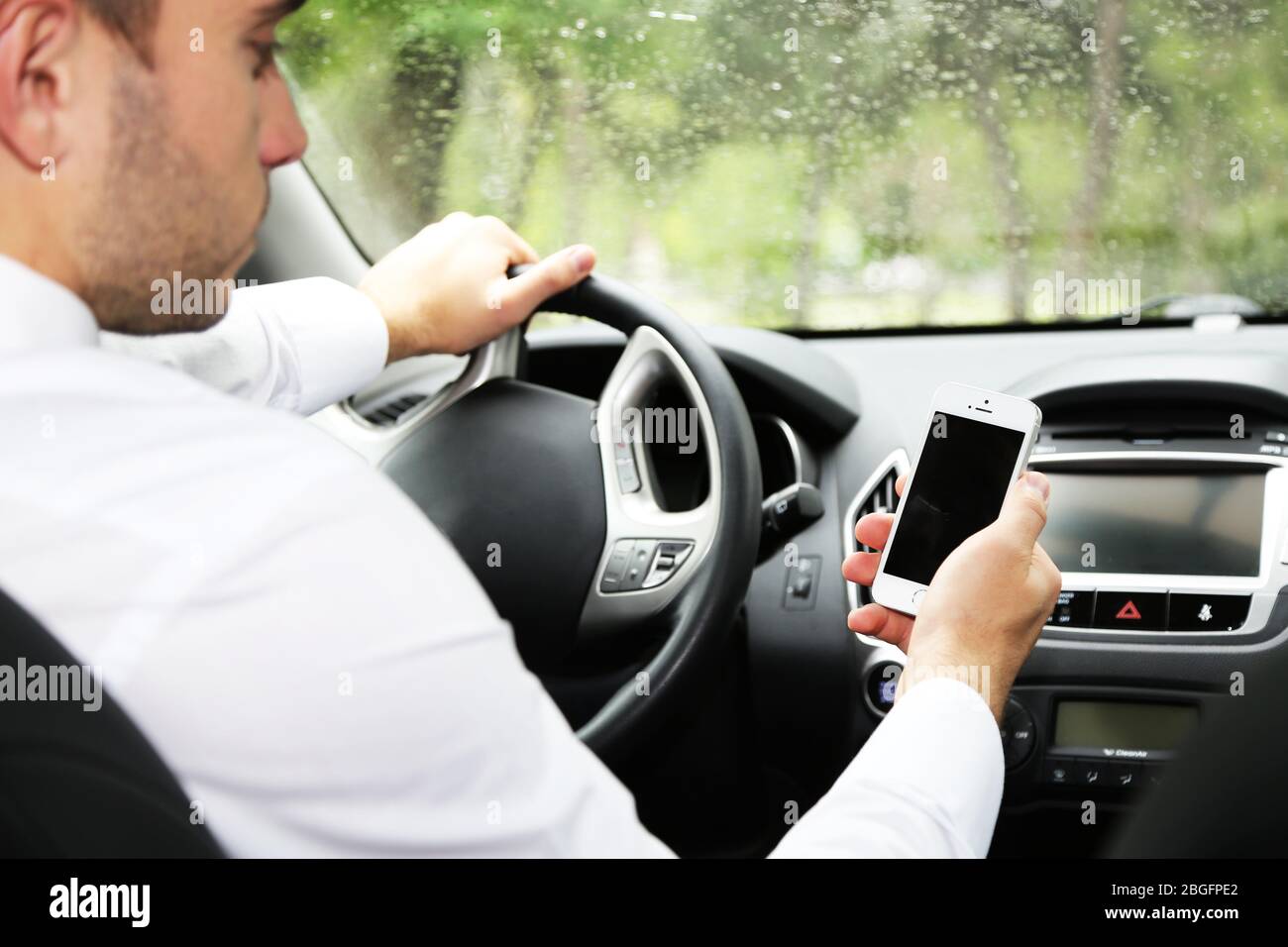 Man driving car Stock Photo - Alamy