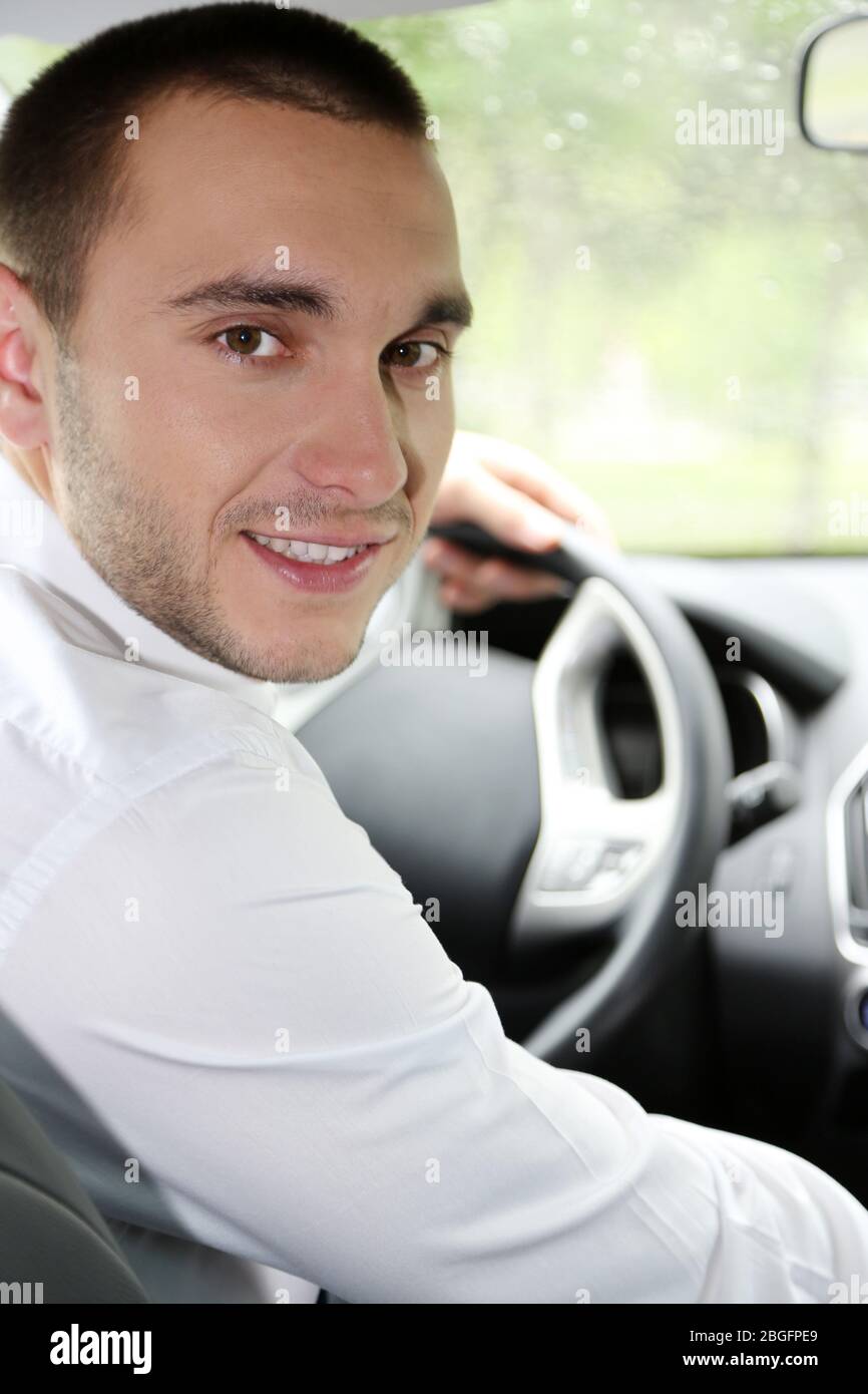 Man driving car Stock Photo - Alamy