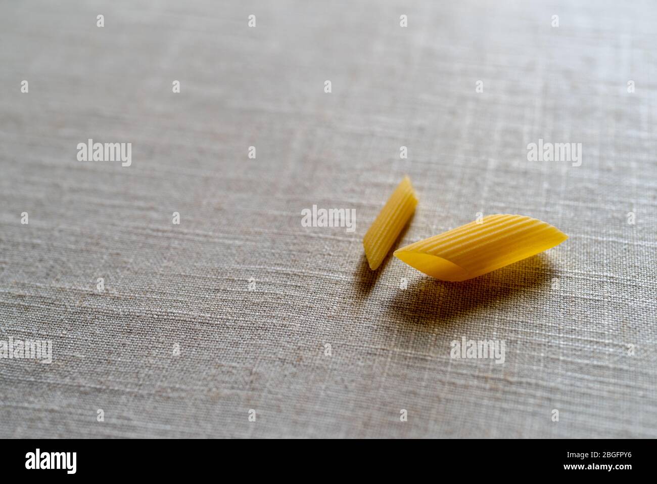 Italian uncooked dry pasta Penne rigate Stock Photo - Alamy
