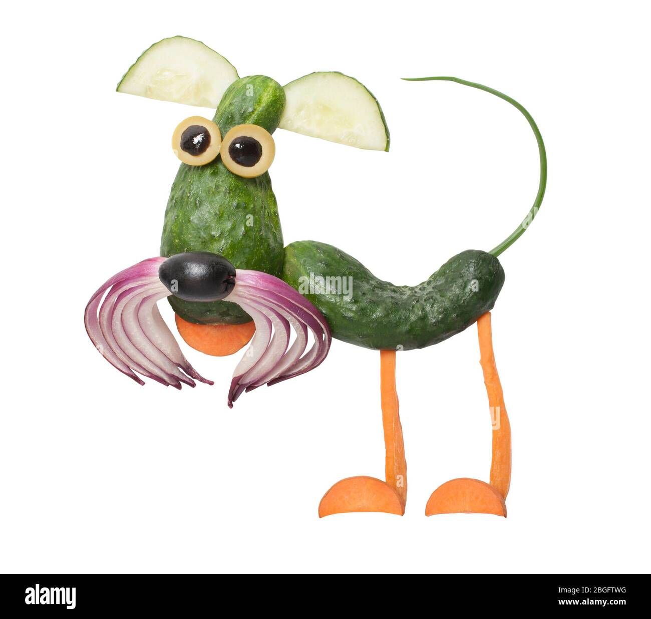 Funny dog made with cucumber and onion Stock Photo - Alamy
