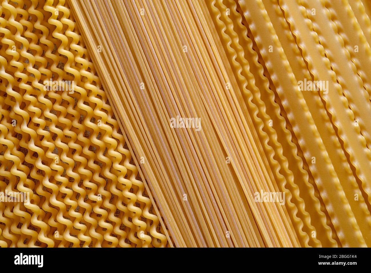 Different types and shapes of dry Italian long cut pasta Stock Photo ...