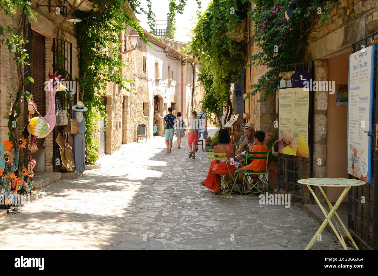 Peratallada, Spain - July 25, 2017: People at stone alley of the ...