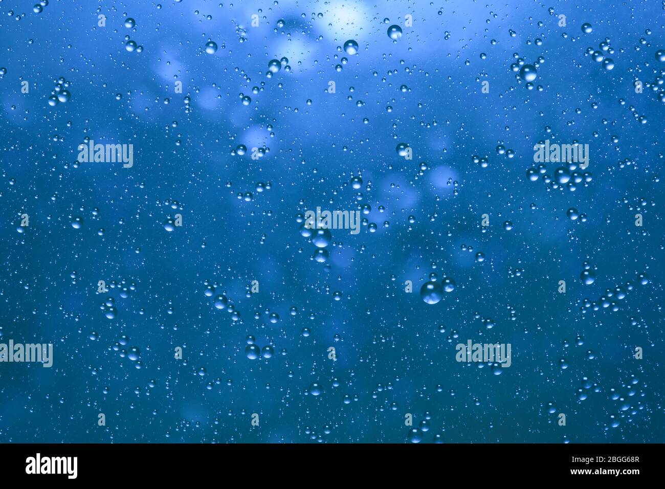 Colored air bubbles in water Stock Photo - Alamy