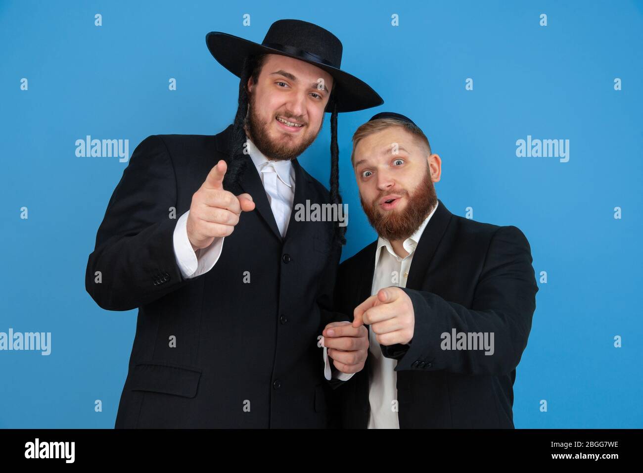 Pointing, choosing. Portrait of a young orthodox jewish men isolated on ...