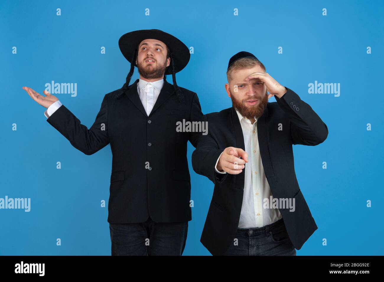 Pointing, choosing. Portrait of a young orthodox jewish men isolated on ...