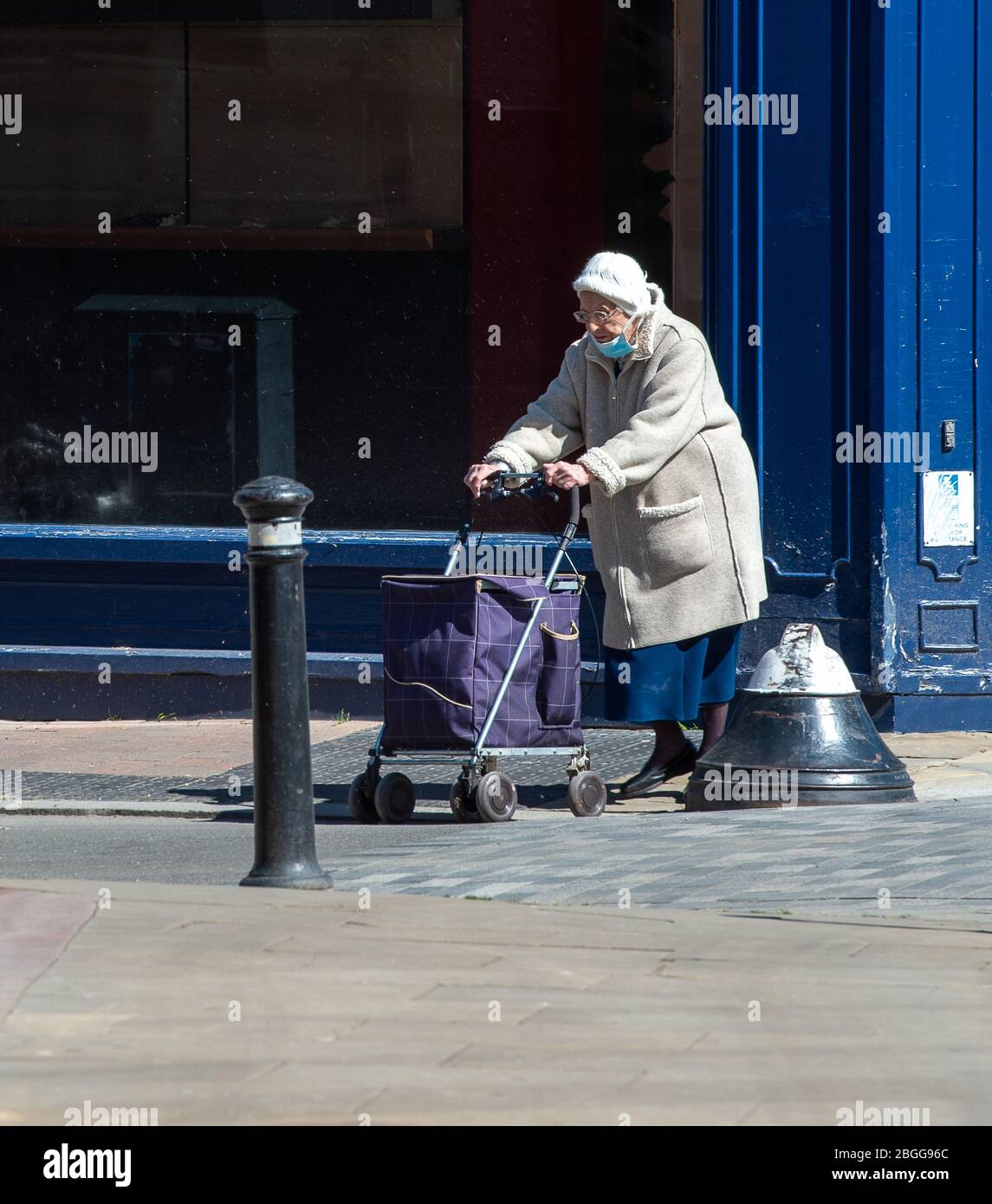 Windsor, Berkshire, UK. 21st April, 2020. A elderly lady does her ...
