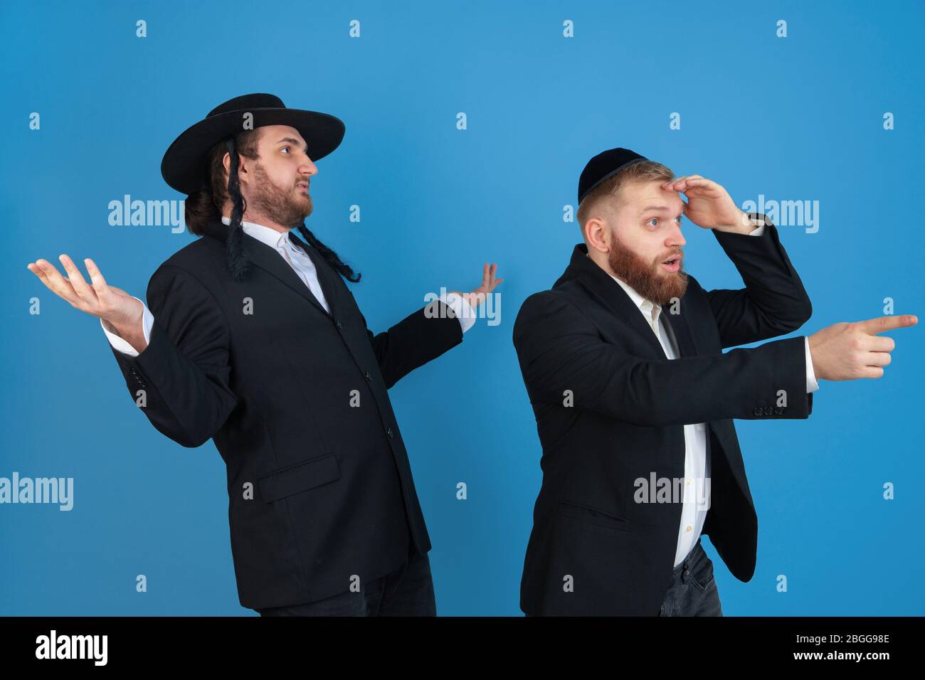 Pointing, choosing. Portrait of a young orthodox jewish men isolated on ...