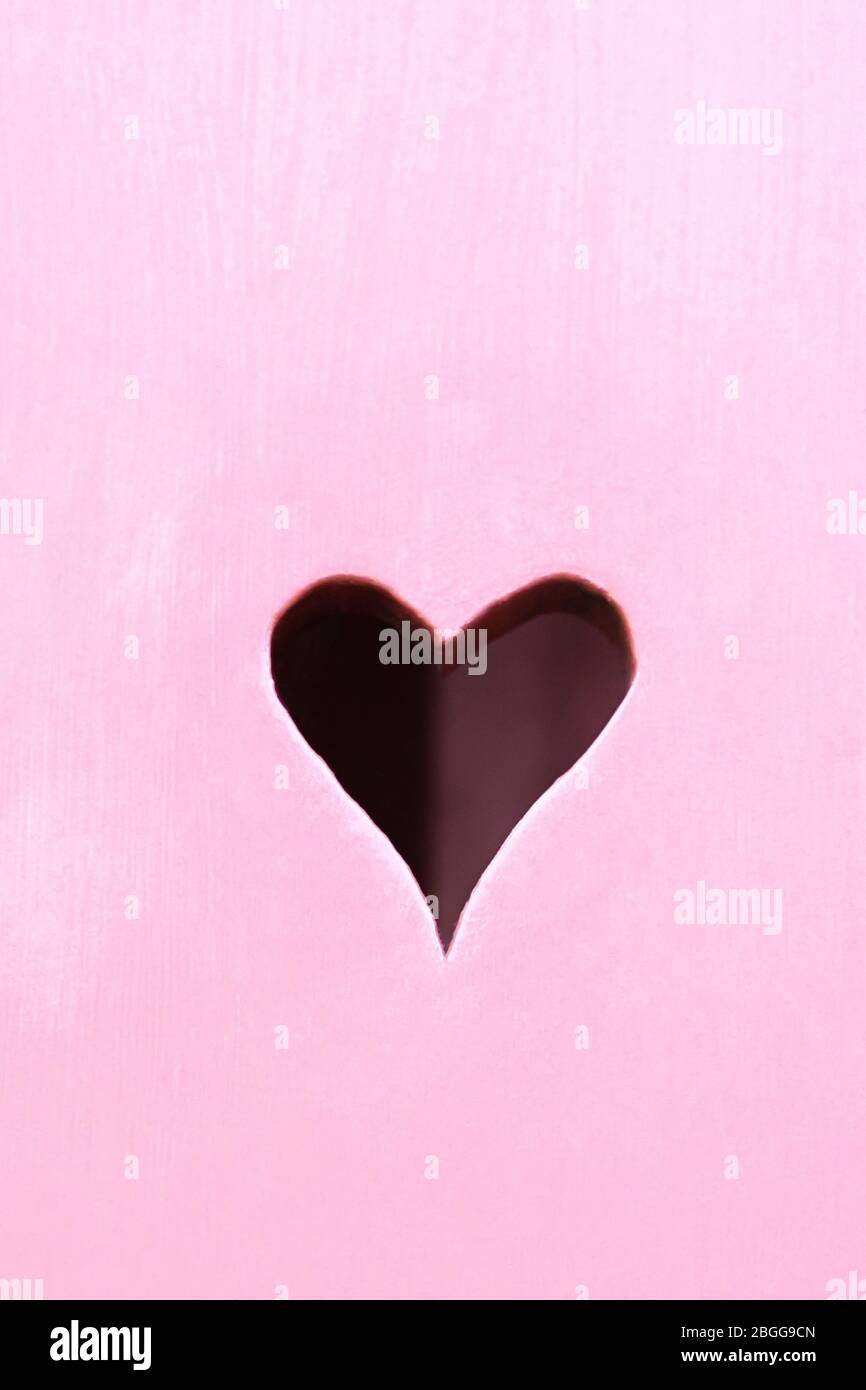 Wooden light pink shutter with a hearts. Details. Copy space Stock ...