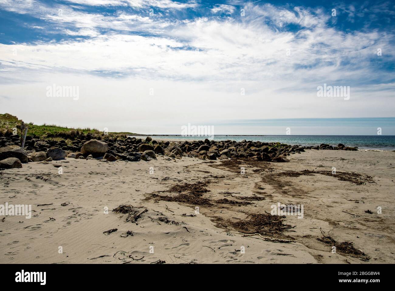 Scenic rocks and large boulders on Refsnesstranda beach near Naerbo ...